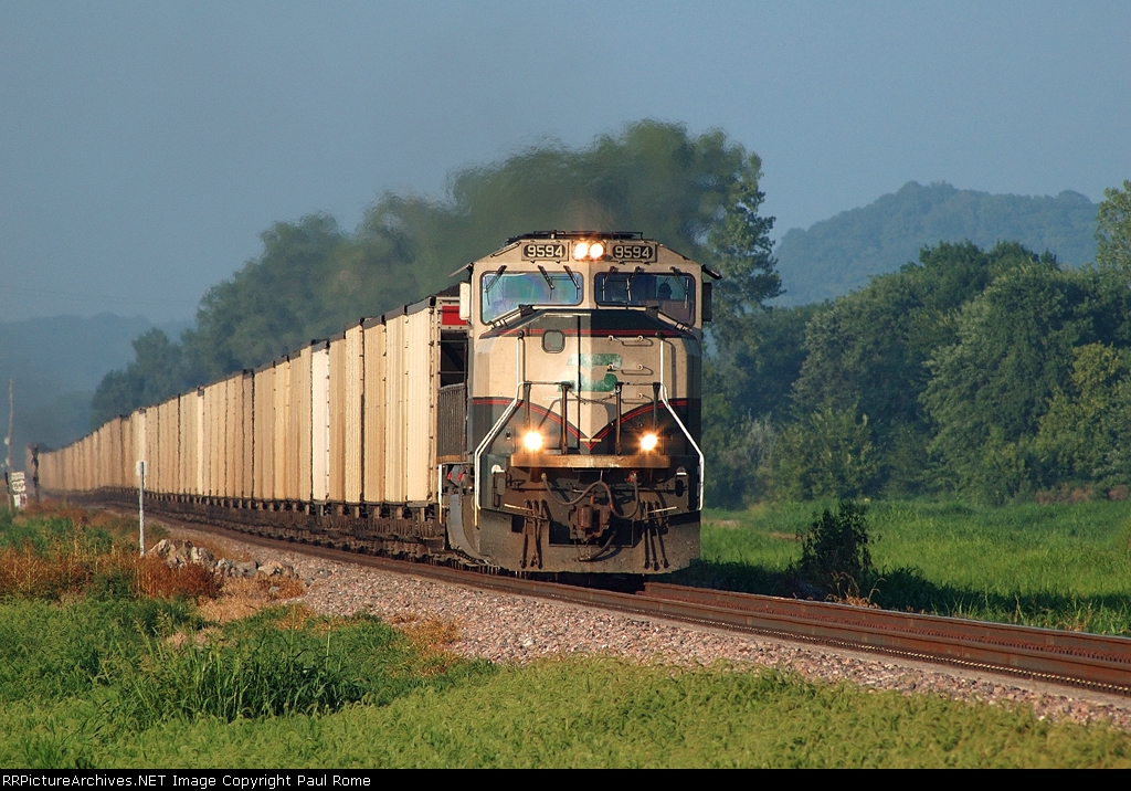 BNSF 9594, EMD SD70MAC, leads southbound coal loads